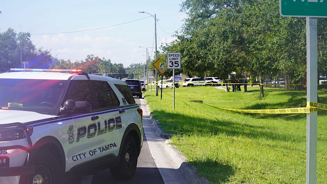 Tampa Police Officer Shot Outside District Two Office, Suspect Found ...